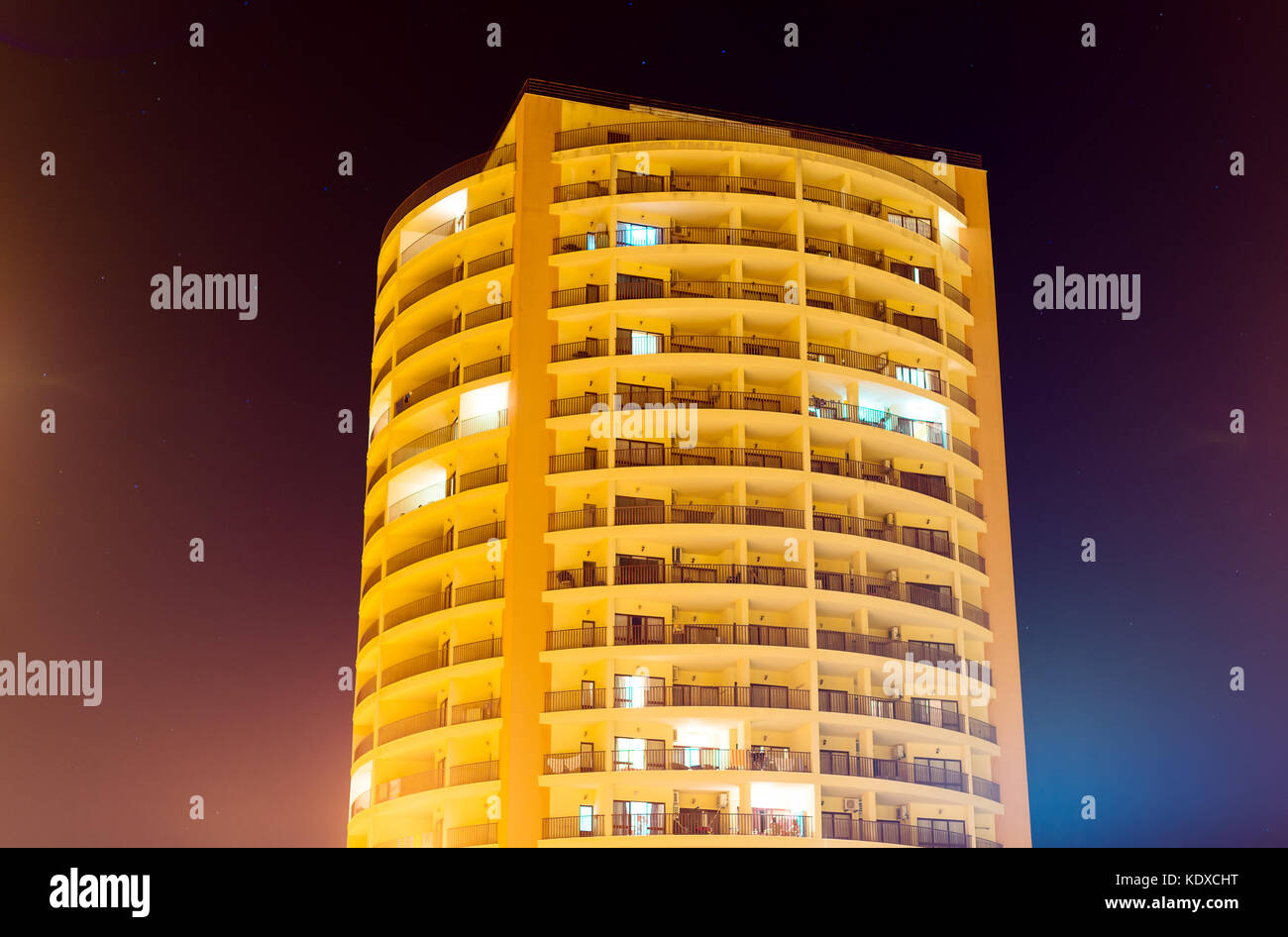 Modern residential building at night Stock Photo - Alamy