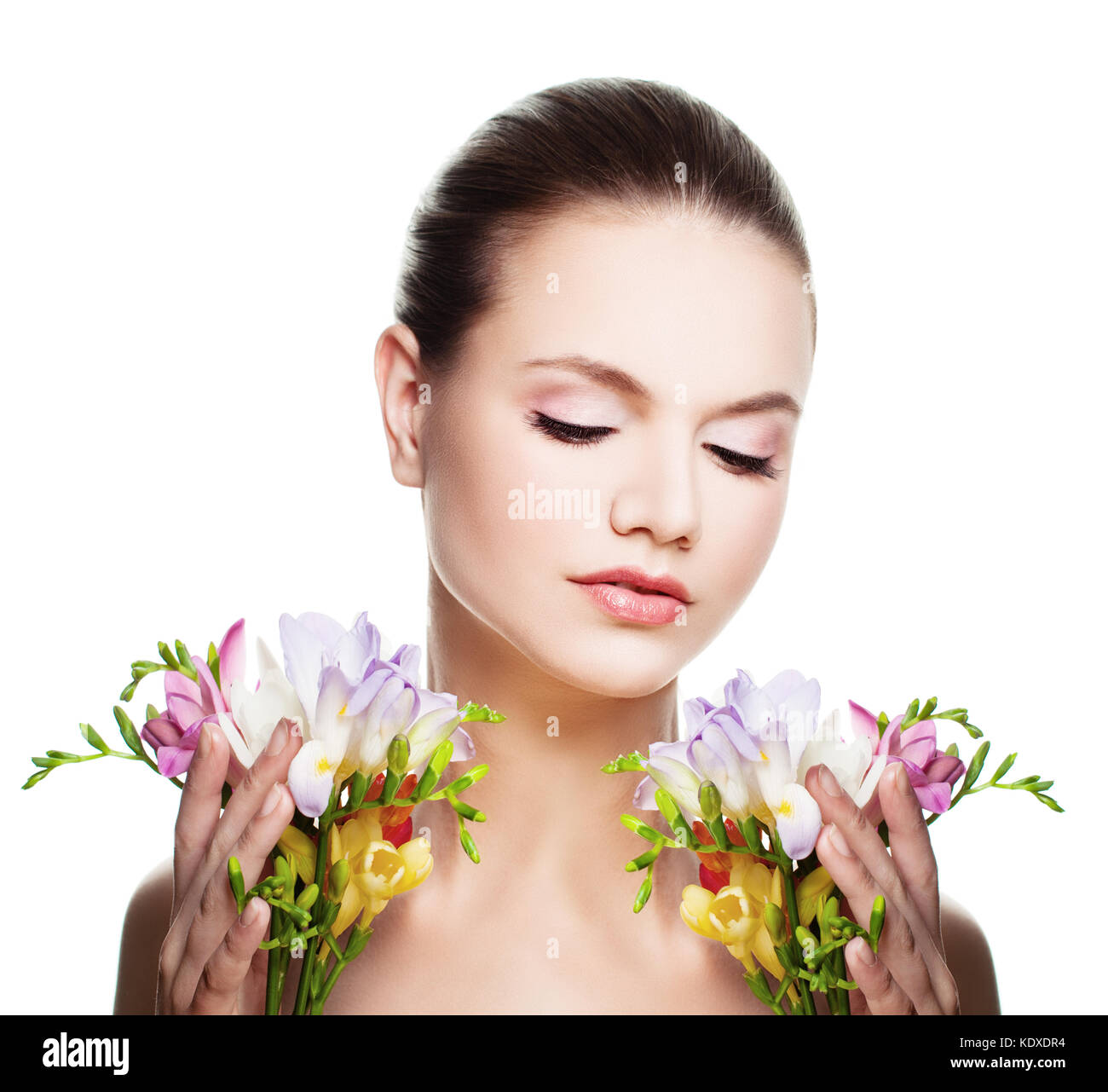 Healthy Woman Spa Model Holding Colorful Flowers in her Hand Stock ...