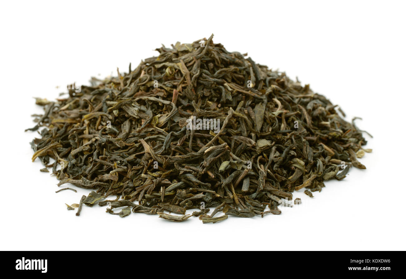 Pile of dry green tea leaves isolated on white Stock Photo - Alamy