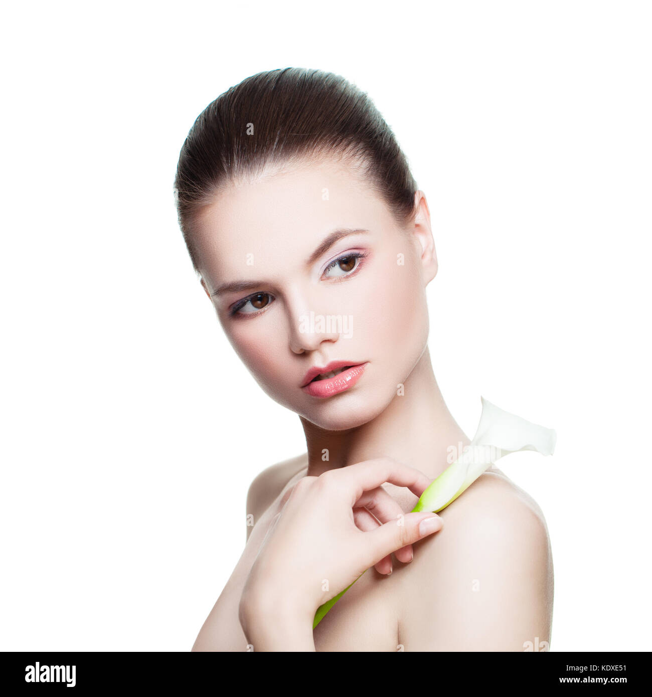 Healthy Woman with Perfect Skin and Lily Flower Isolated on White ...