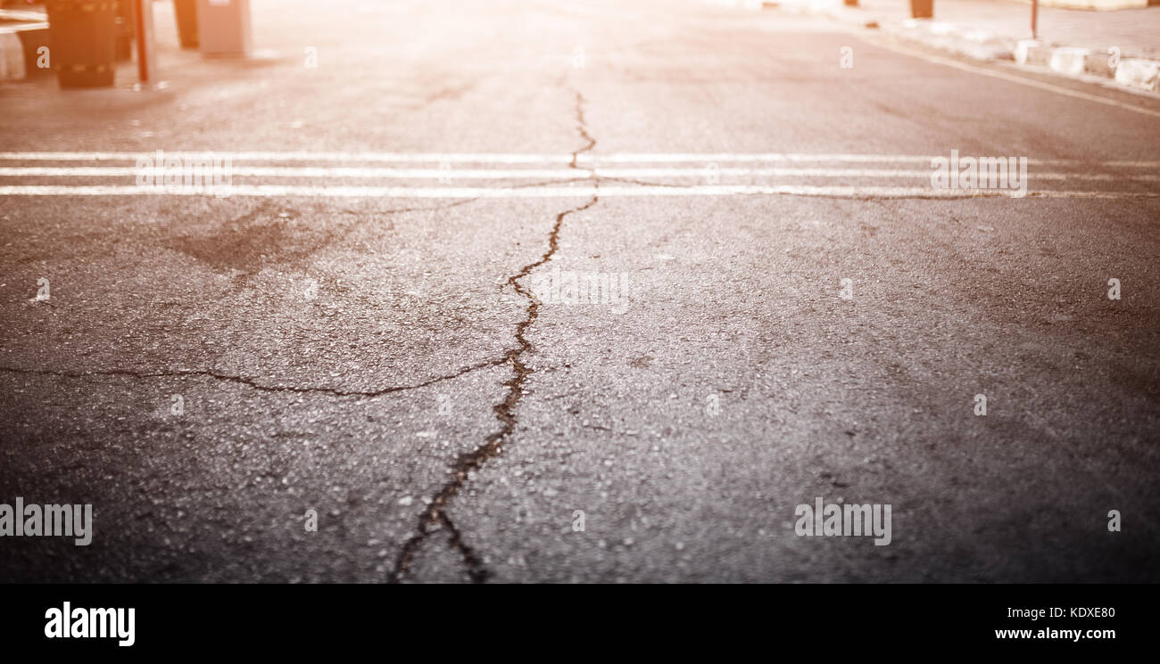 Texture of the old road with cracks. Asphalt surface on the street ...
