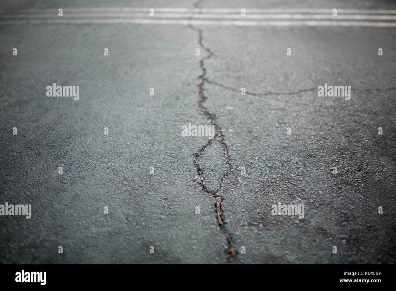 Texture of the old road with cracks. Asphalt surface on the street ...