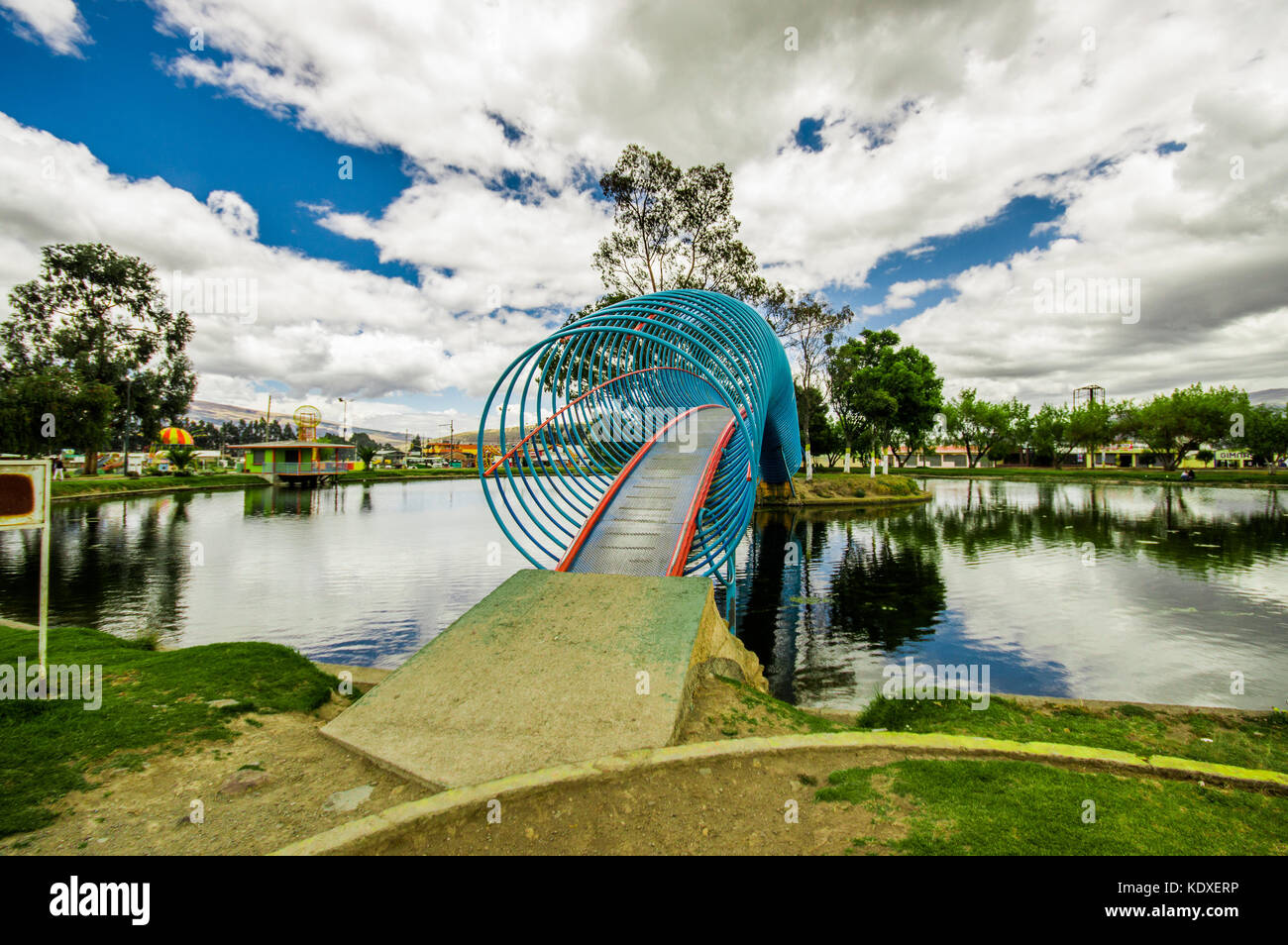 Beautiful colorful bridge over an artificial lake located in the midle ...