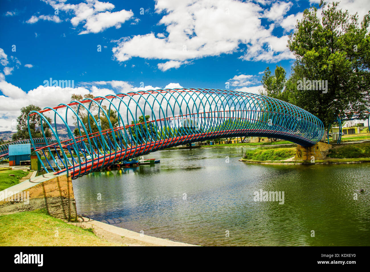 Beautiful colorful bridge over an artificial lake located in the midle ...