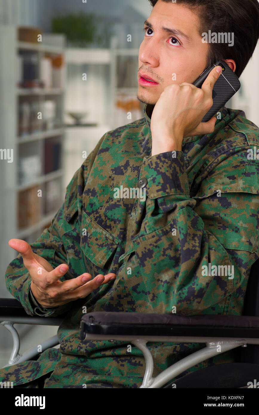 Male soldier sitting in chair hi-res stock photography and images - Alamy