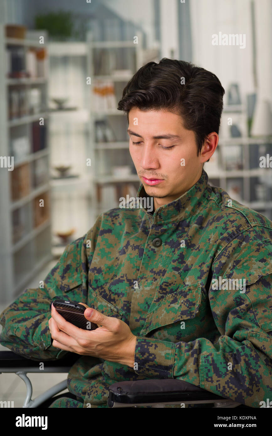Male soldier sitting in chair hi-res stock photography and images - Alamy