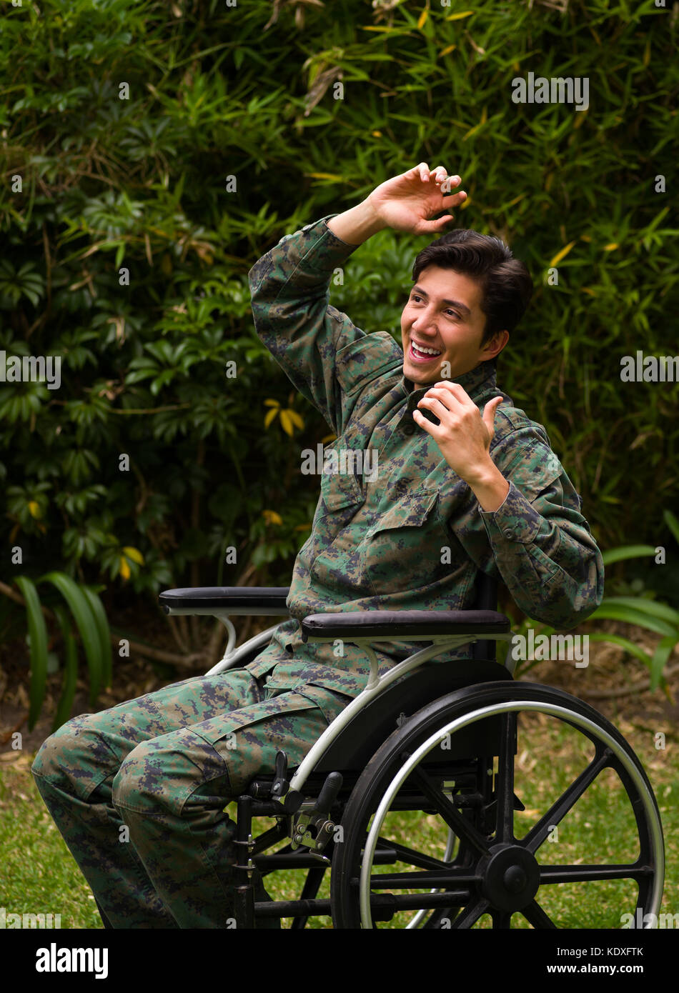 Male soldier sitting in chair hi-res stock photography and images - Alamy
