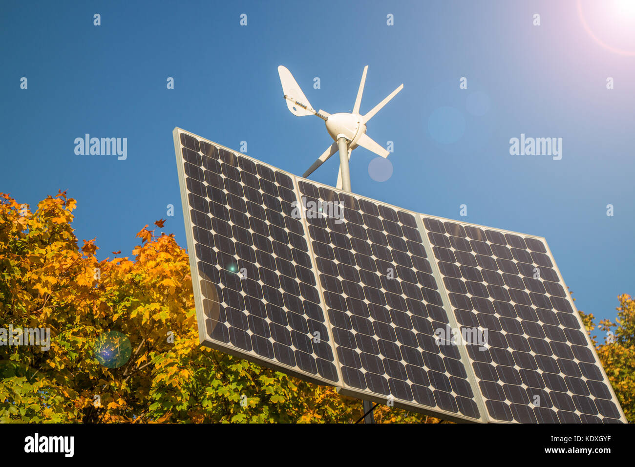 Small private Solar panels and rotor, Renewable energy Stock Photo - Alamy