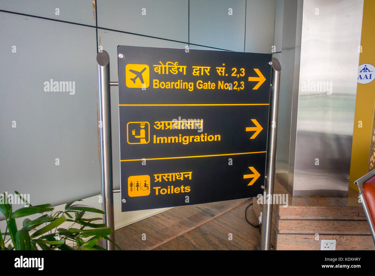 DELHI, INDIA - SEPTEMBER 19, 2017: Informative sign with yellow letters ...
