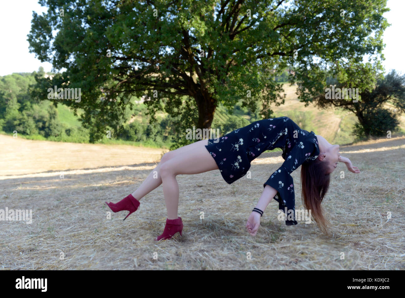 young flying woman floating in the air Stock Photo - Alamy