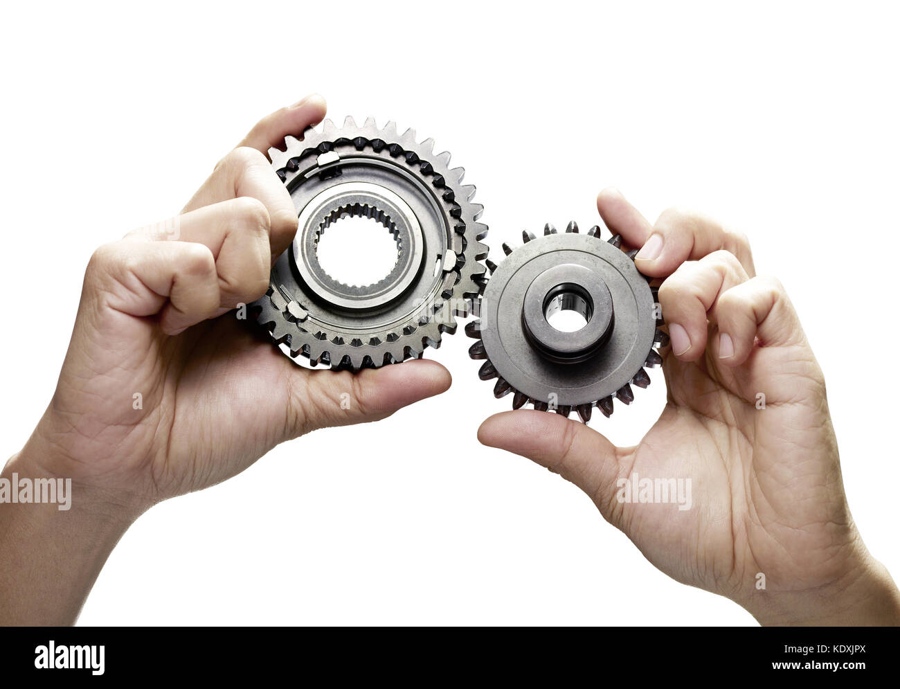 hands connecting gears on a white background Stock Photo - Alamy