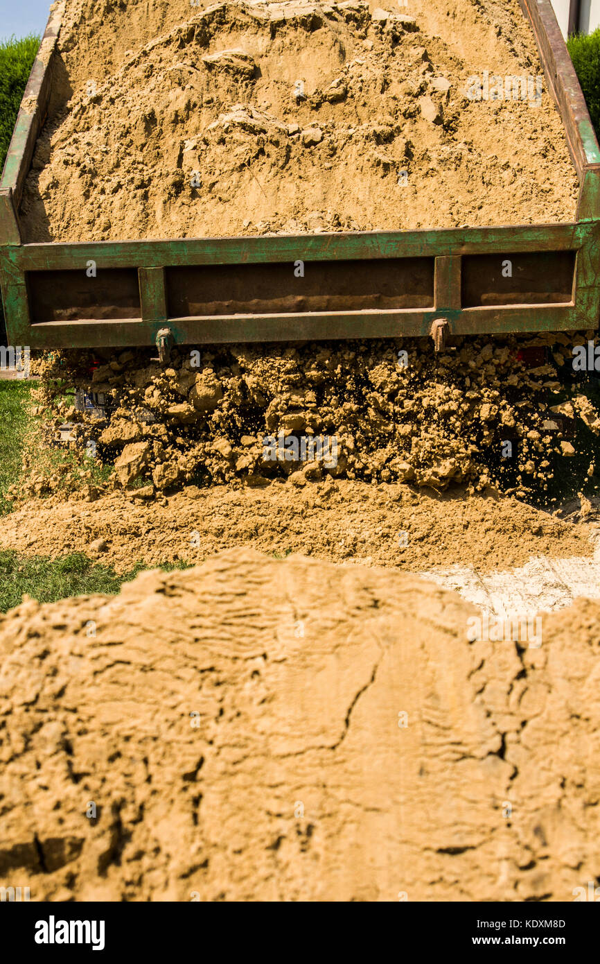 Dump truck dumping load hi-res stock photography and images - Alamy