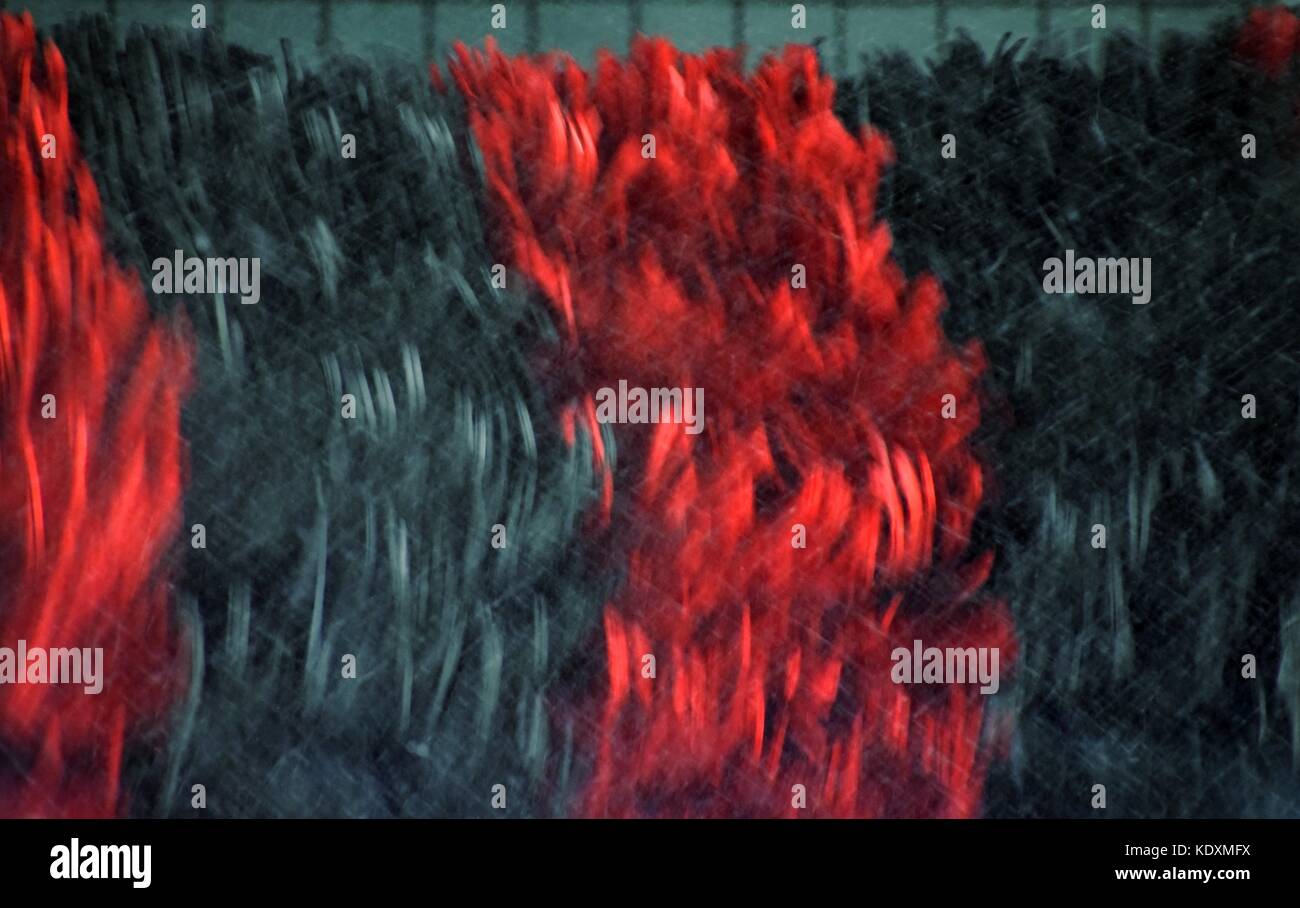 rotating flap System in a car wash, Abstract car wash in red and black ...
