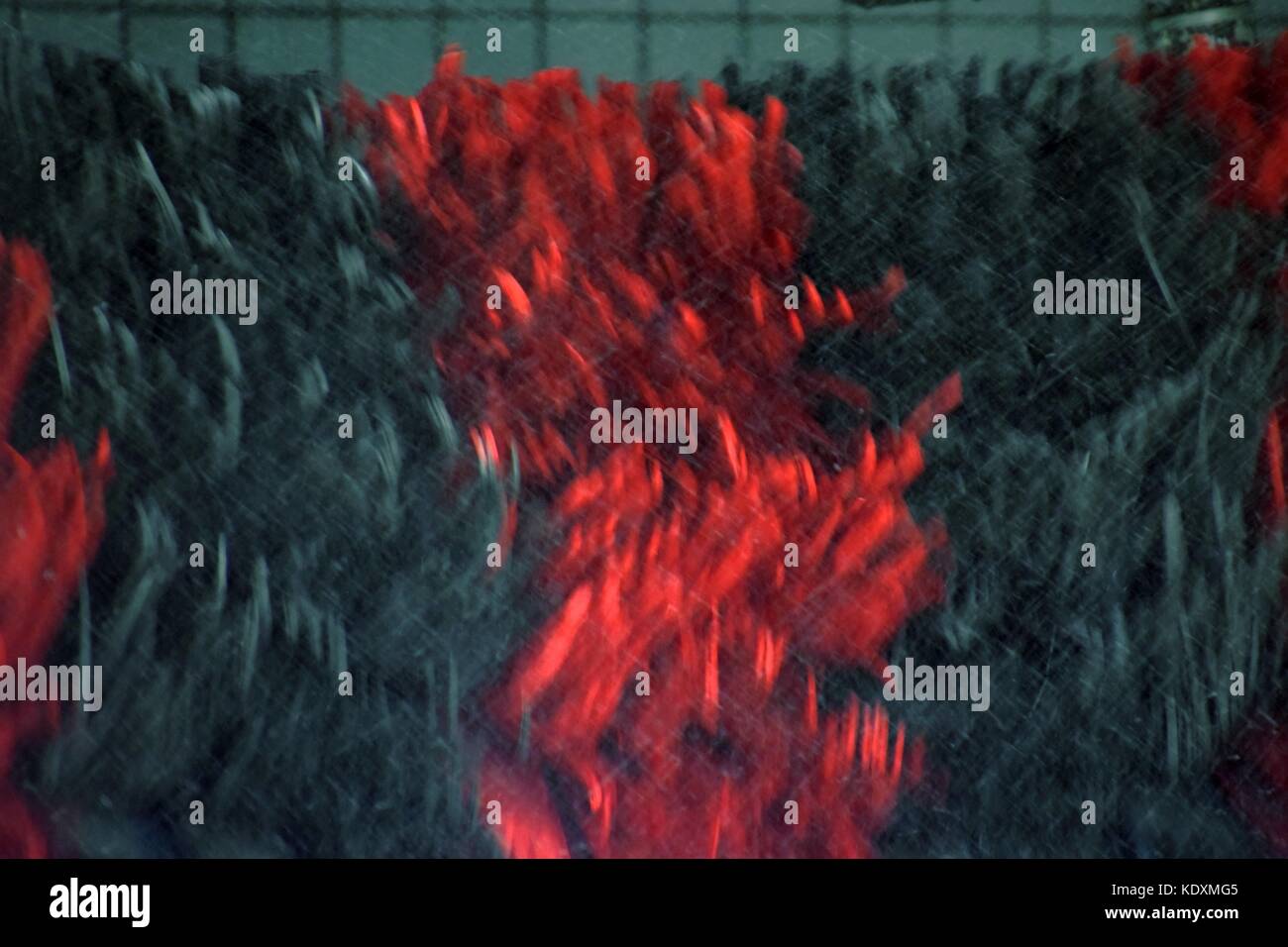 rotating flap System in a car wash, Abstract car wash in red and black ...