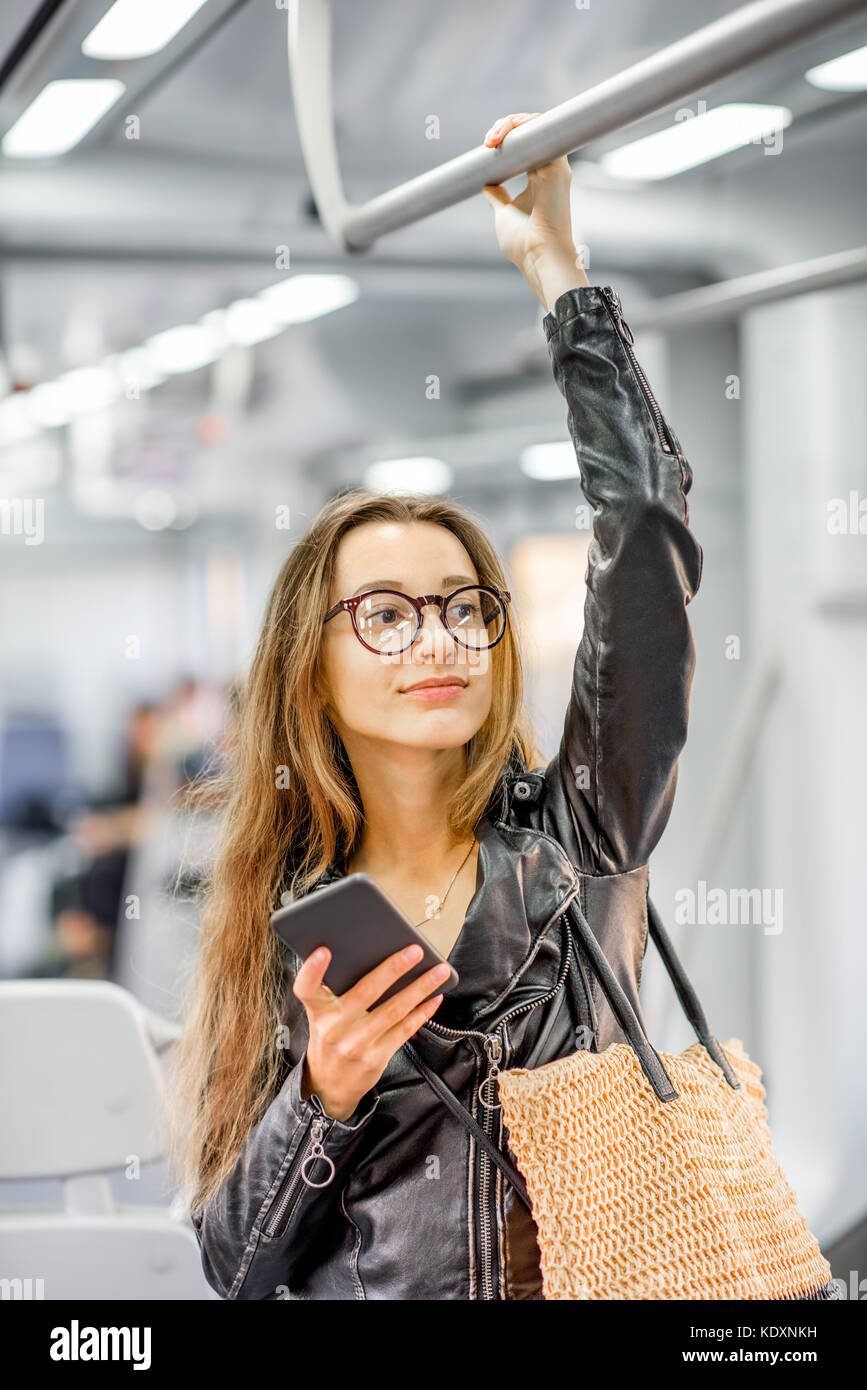 Woman riding at the modern train Stock Photo - Alamy
