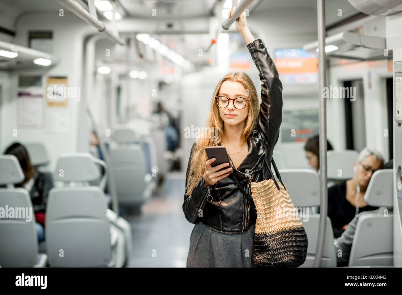 Woman riding at the modern train Stock Photo - Alamy