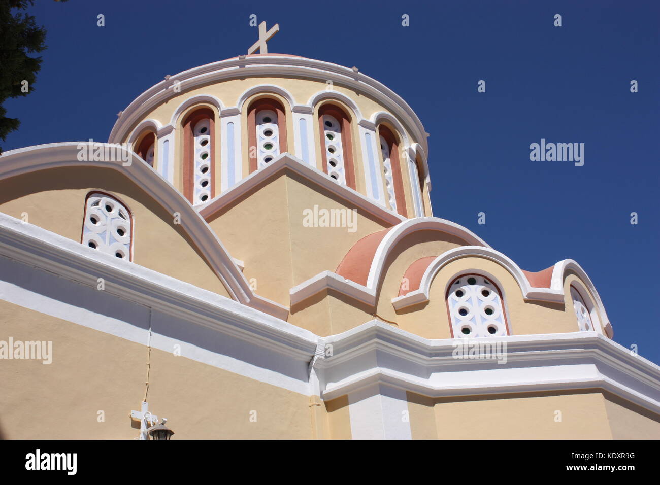 Greek Orthodox Church overlooking Harani Bay, Symi Town, Dodecanese ...