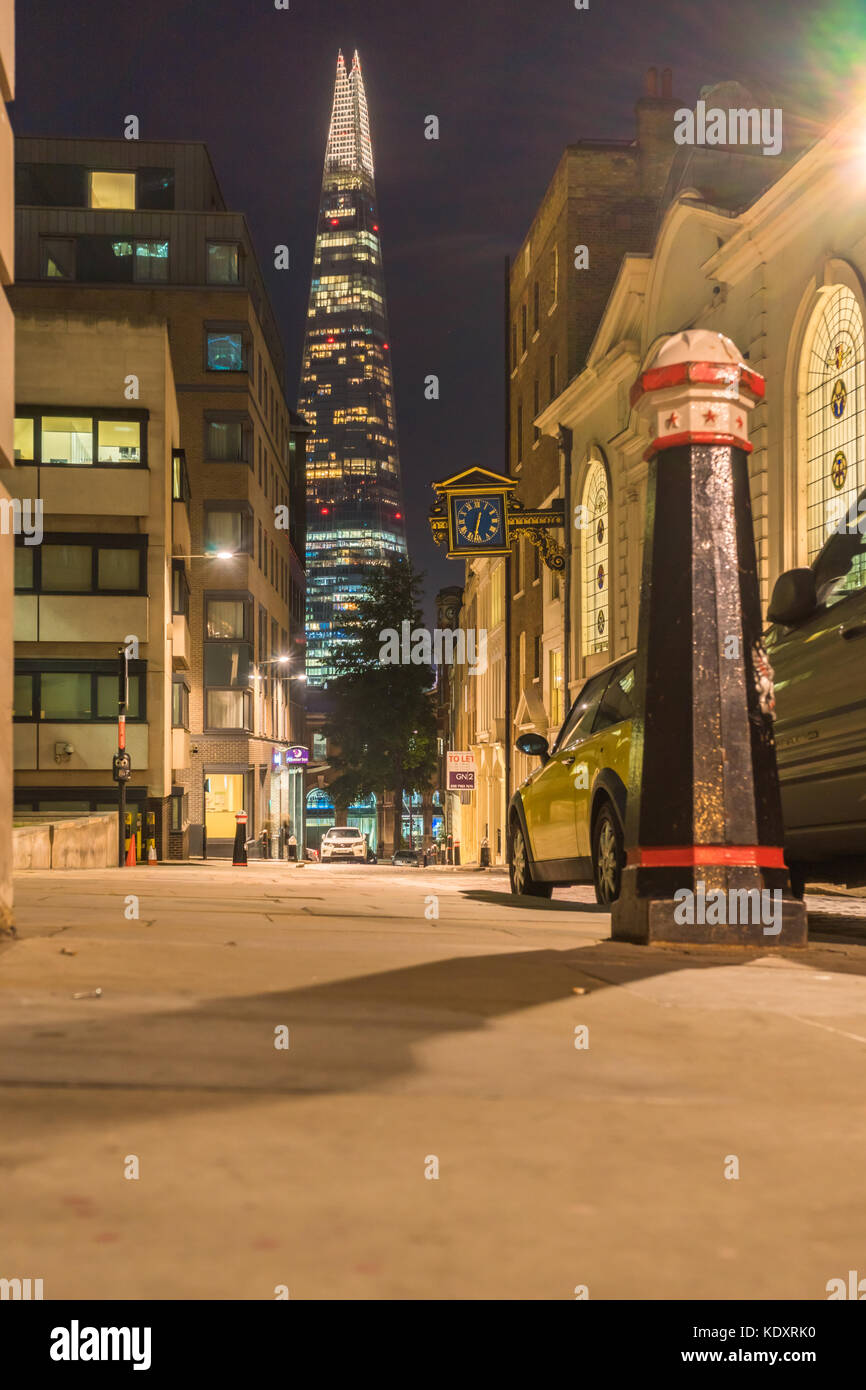 The Shard illuminated at night seen from St Mary at Hill in the City of ...