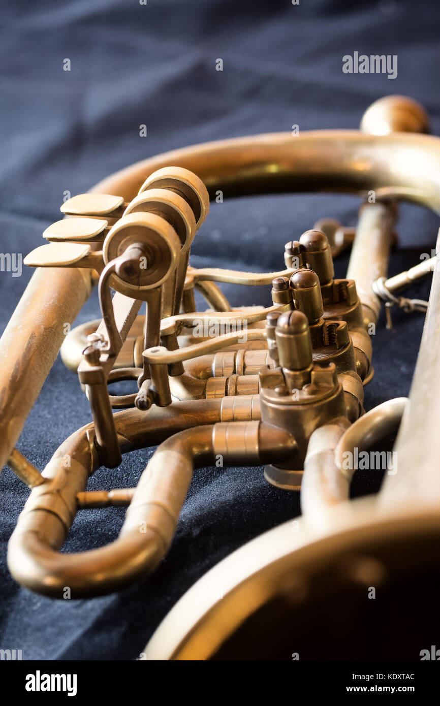Used old trumpet closeup. Edited as a vintage photo with dark edges ...