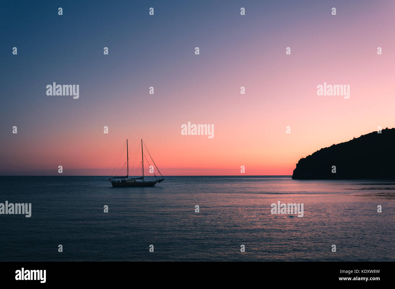 Sunset over Budva bay, Montenegro Stock Photo - Alamy