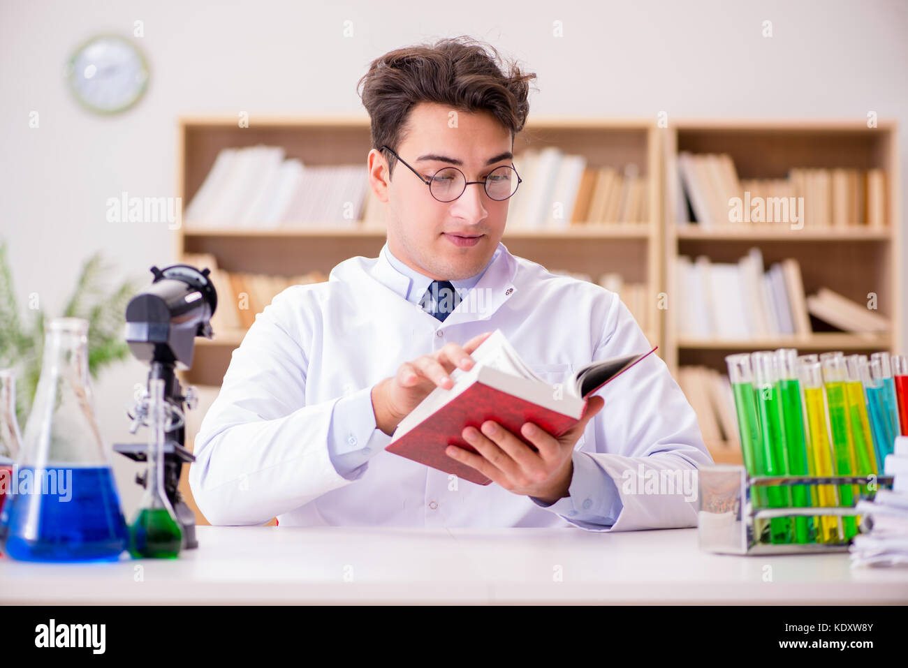 Mad crazy scientist doctor doing experiments in a laboratory Stock ...