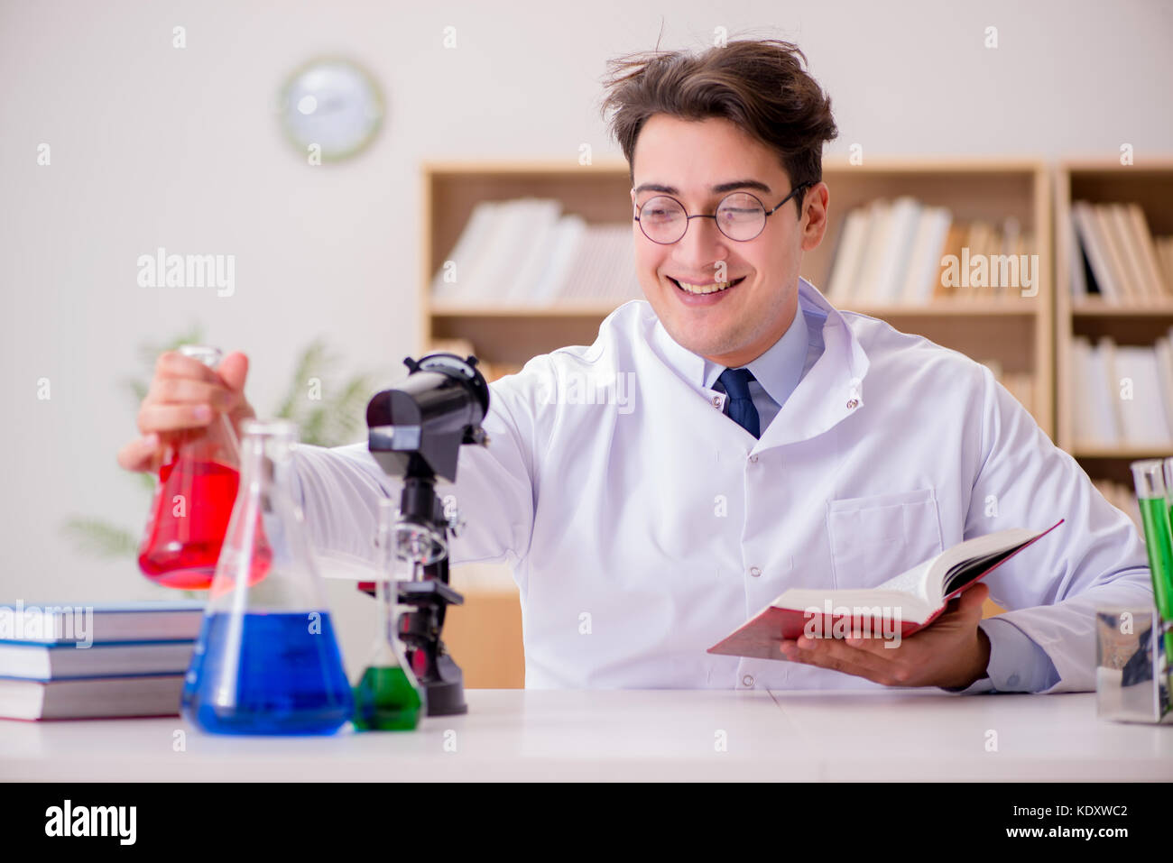 Mad crazy scientist doctor doing experiments in a laboratory Stock ...