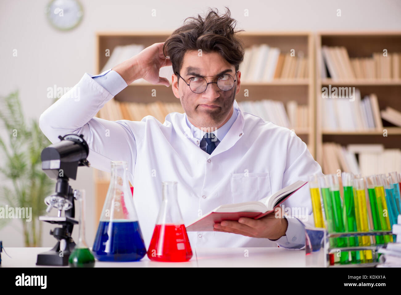 Mad crazy scientist doctor doing experiments in a laboratory Stock ...