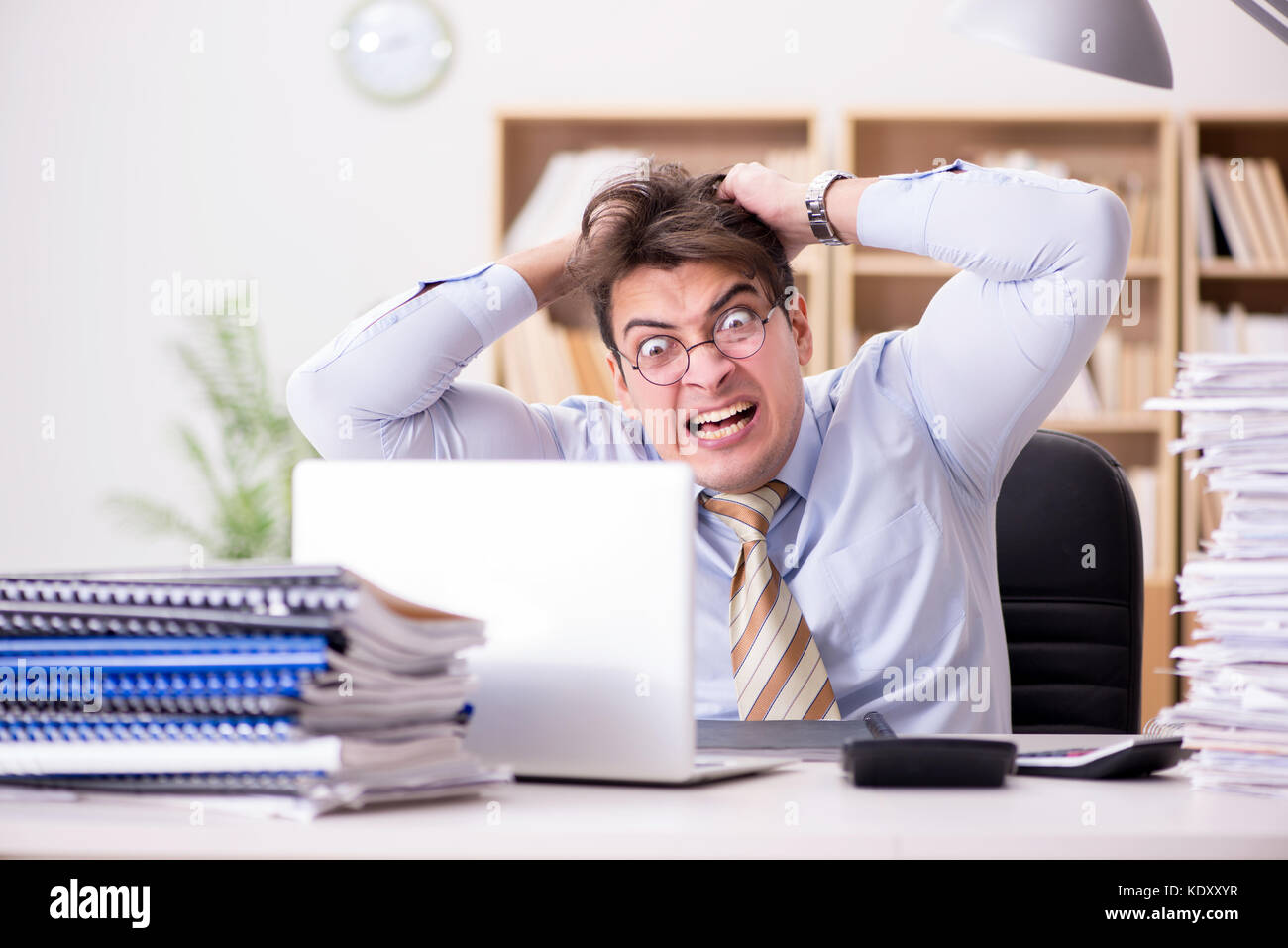 Funny accountant bookkeeper working in the office Stock Photo - Alamy