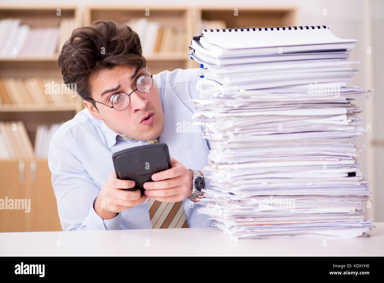 Funny accountant bookkeeper working in the office Stock Photo - Alamy