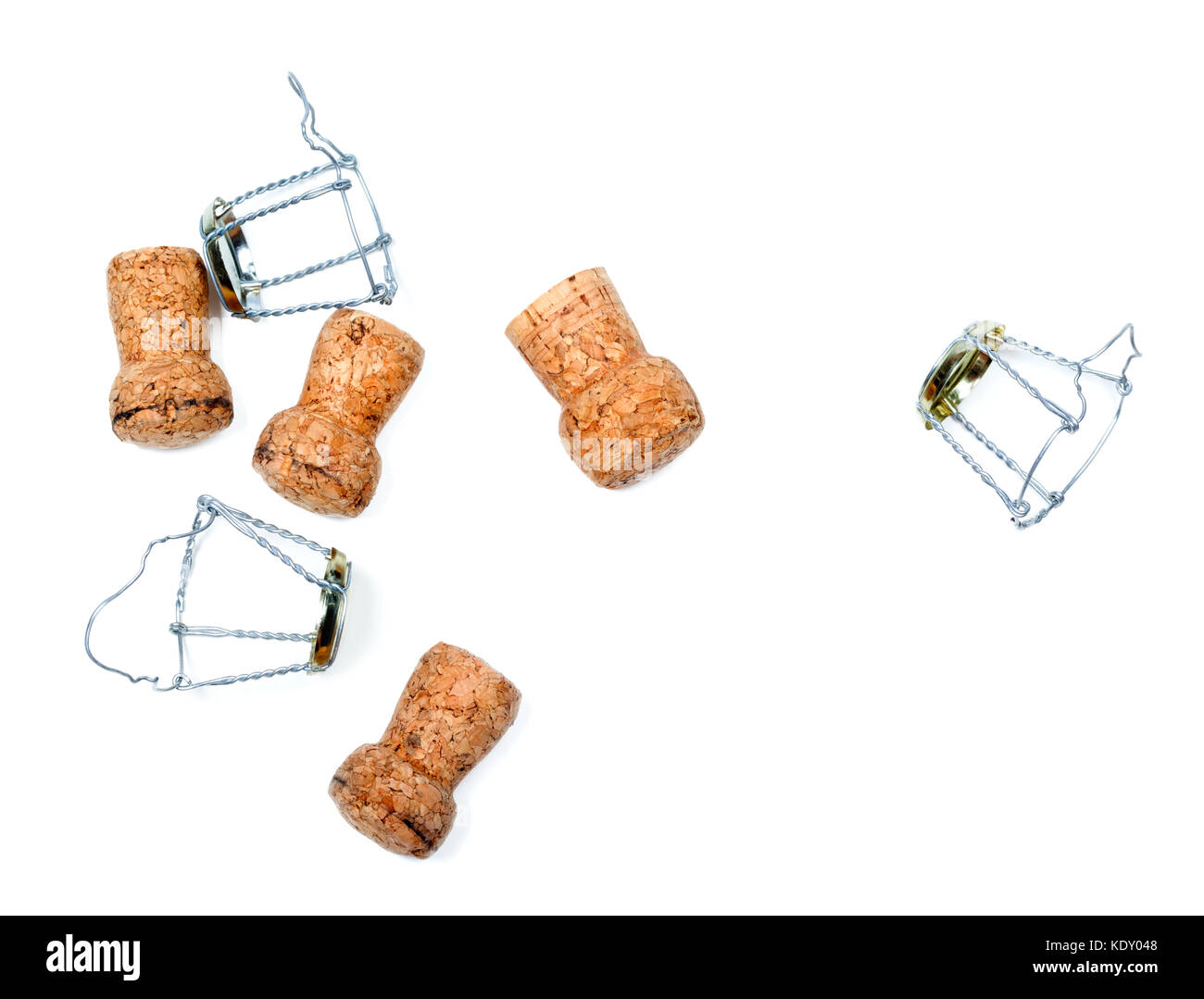 Corks from champagne wine and muselets after party. Isolated on white ...