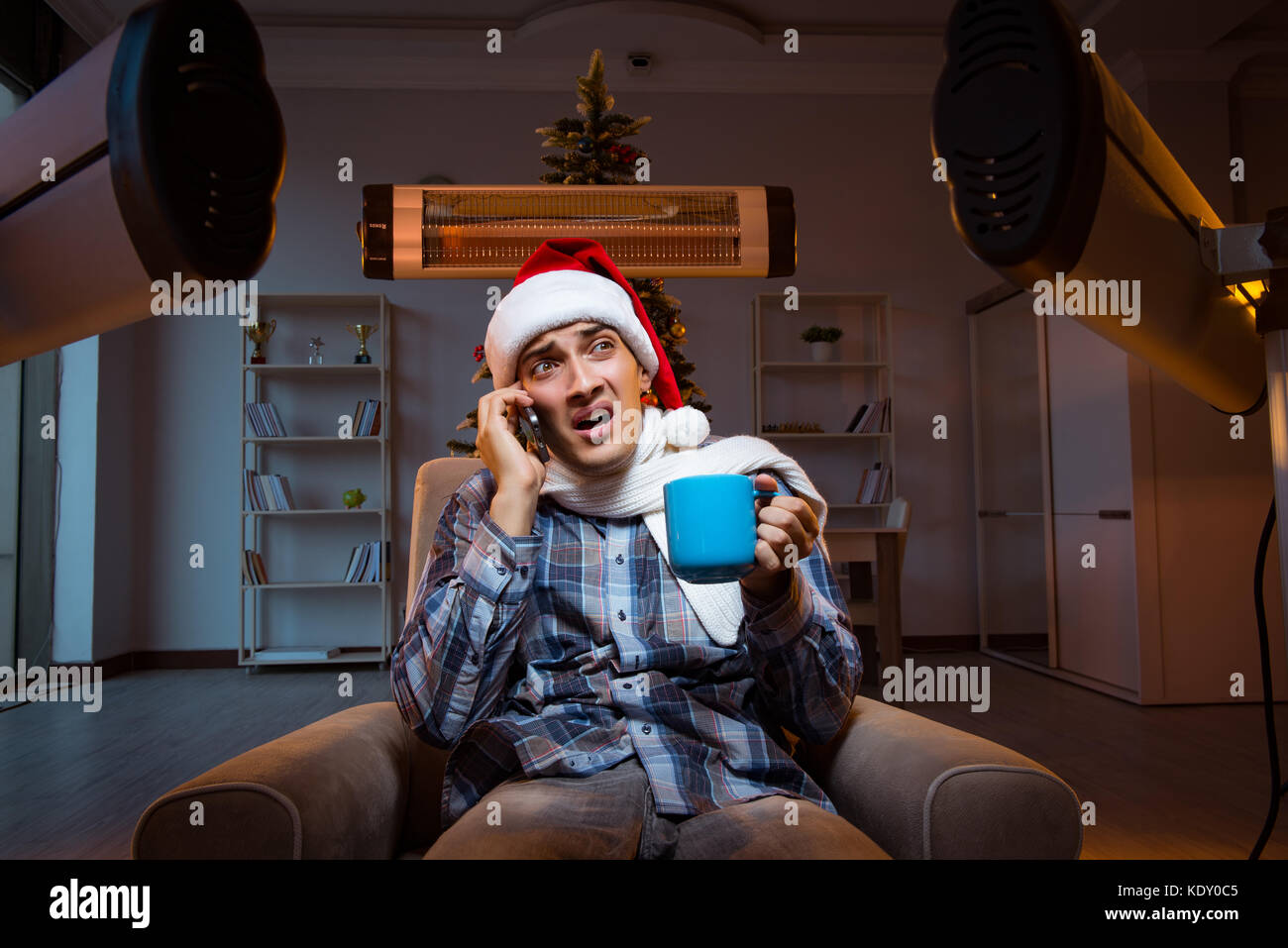 Man suffering from cold at home Stock Photo - Alamy
