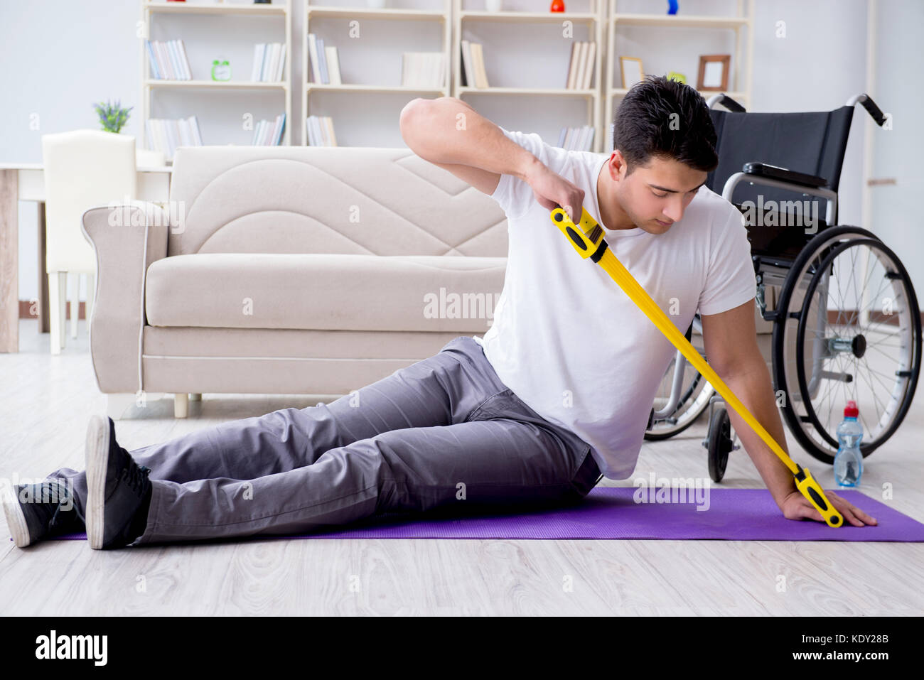 Disabled man recovering from injury at home Stock Photo - Alamy