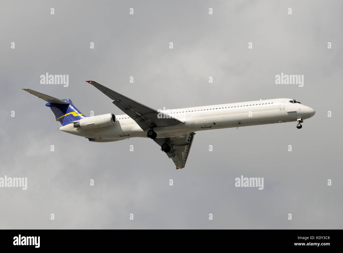 Passenger jet airplane arriving at destination Stock Photo - Alamy