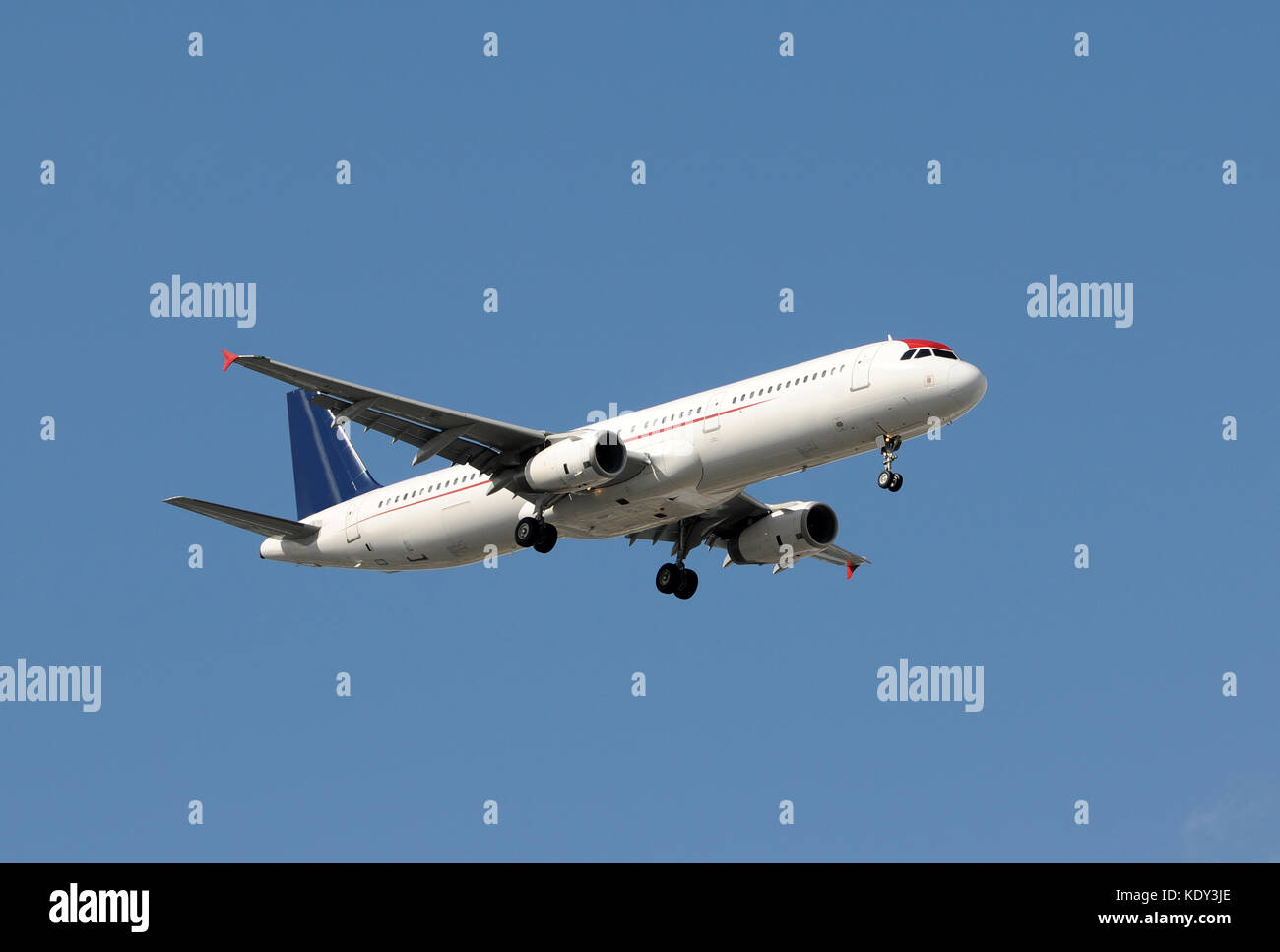 Modern passenger jet airplane in flight Stock Photo - Alamy