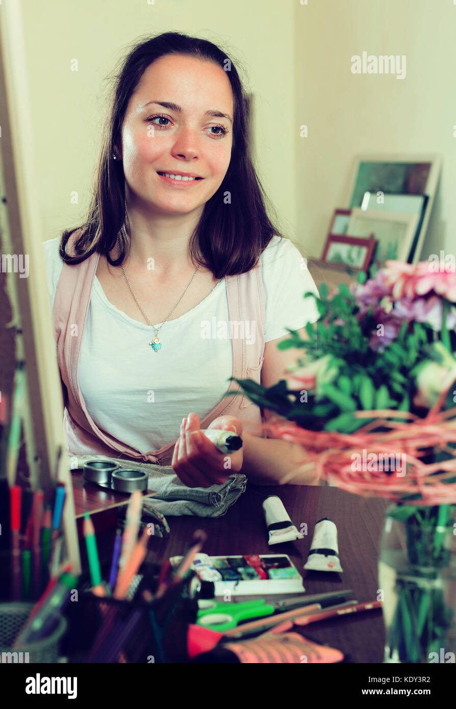 Young artist in the process of creating a new picture Stock Photo - Alamy