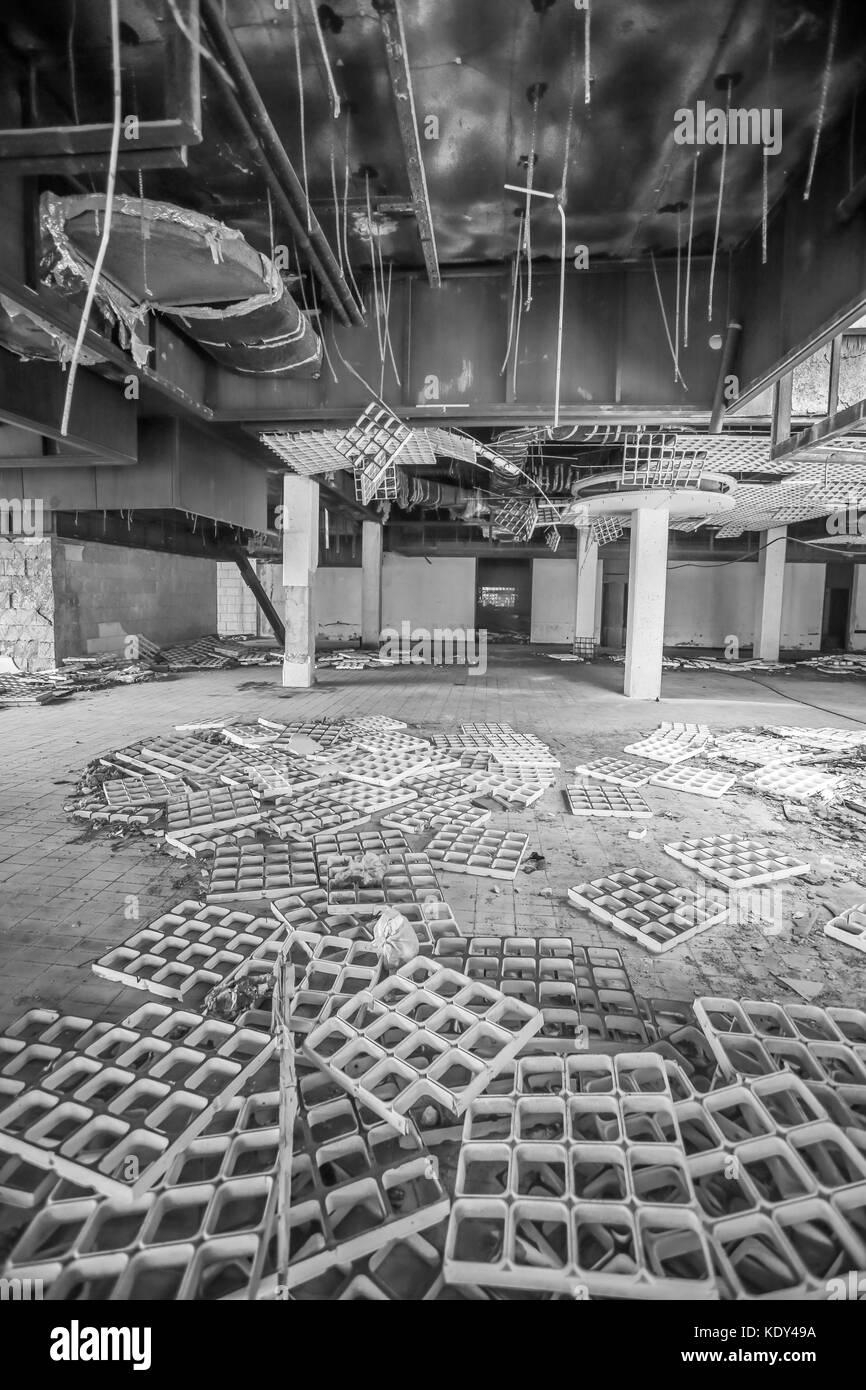 Destroyed interior of an old ruined hotel Stock Photo - Alamy