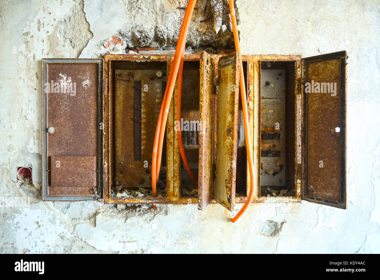 Old ruined electric closet on the wall Stock Photo - Alamy