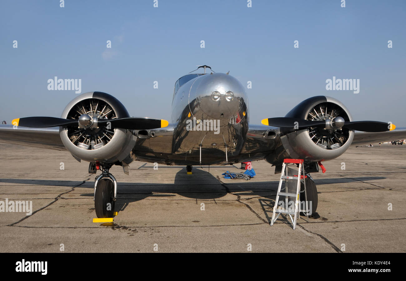 Retro propeller airplane in silver color front view Stock Photo - Alamy