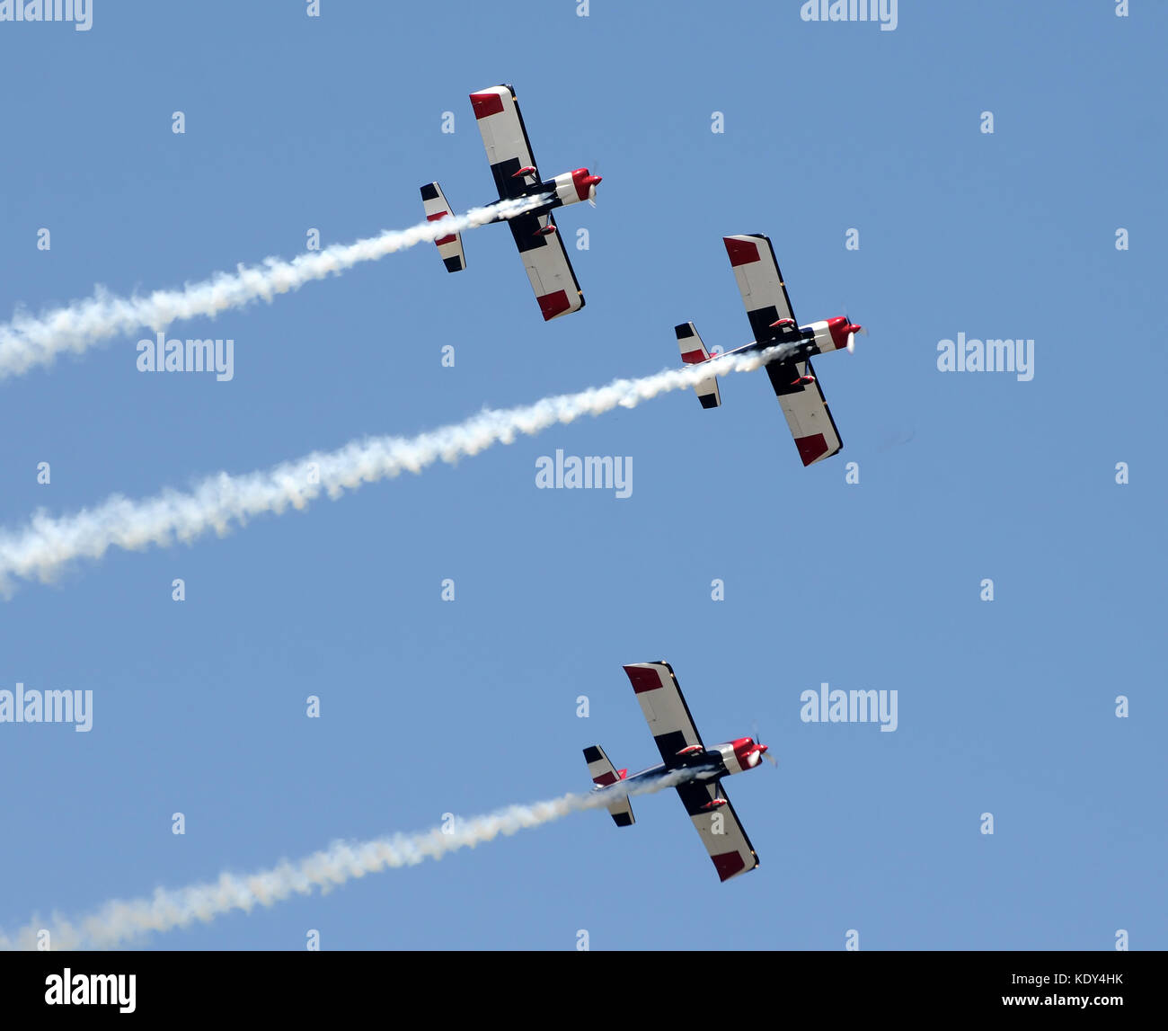Three propeller airplanes practicing formation flying Stock Photo - Alamy