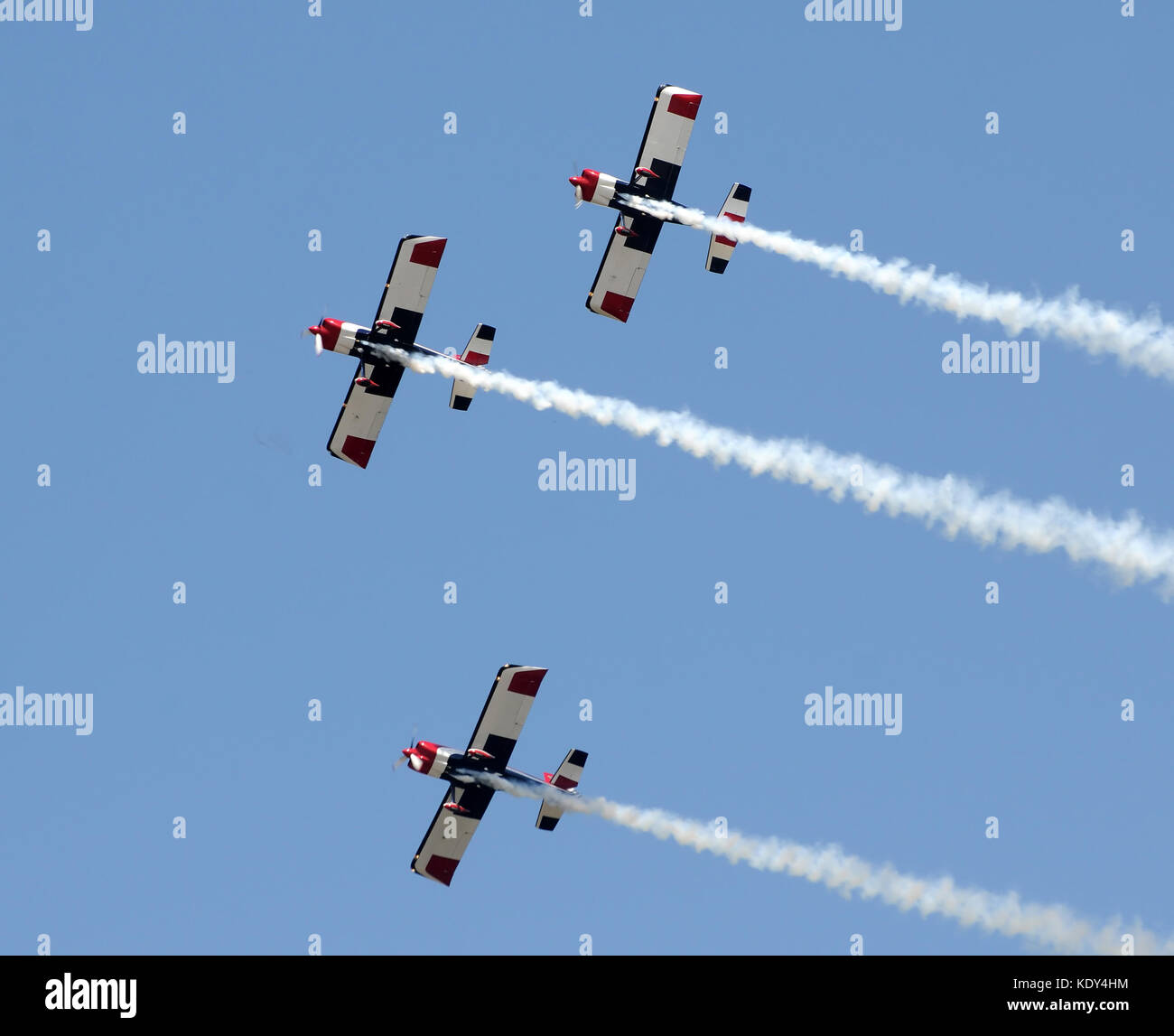 Three propeller airplanes practicing formation flying Stock Photo - Alamy