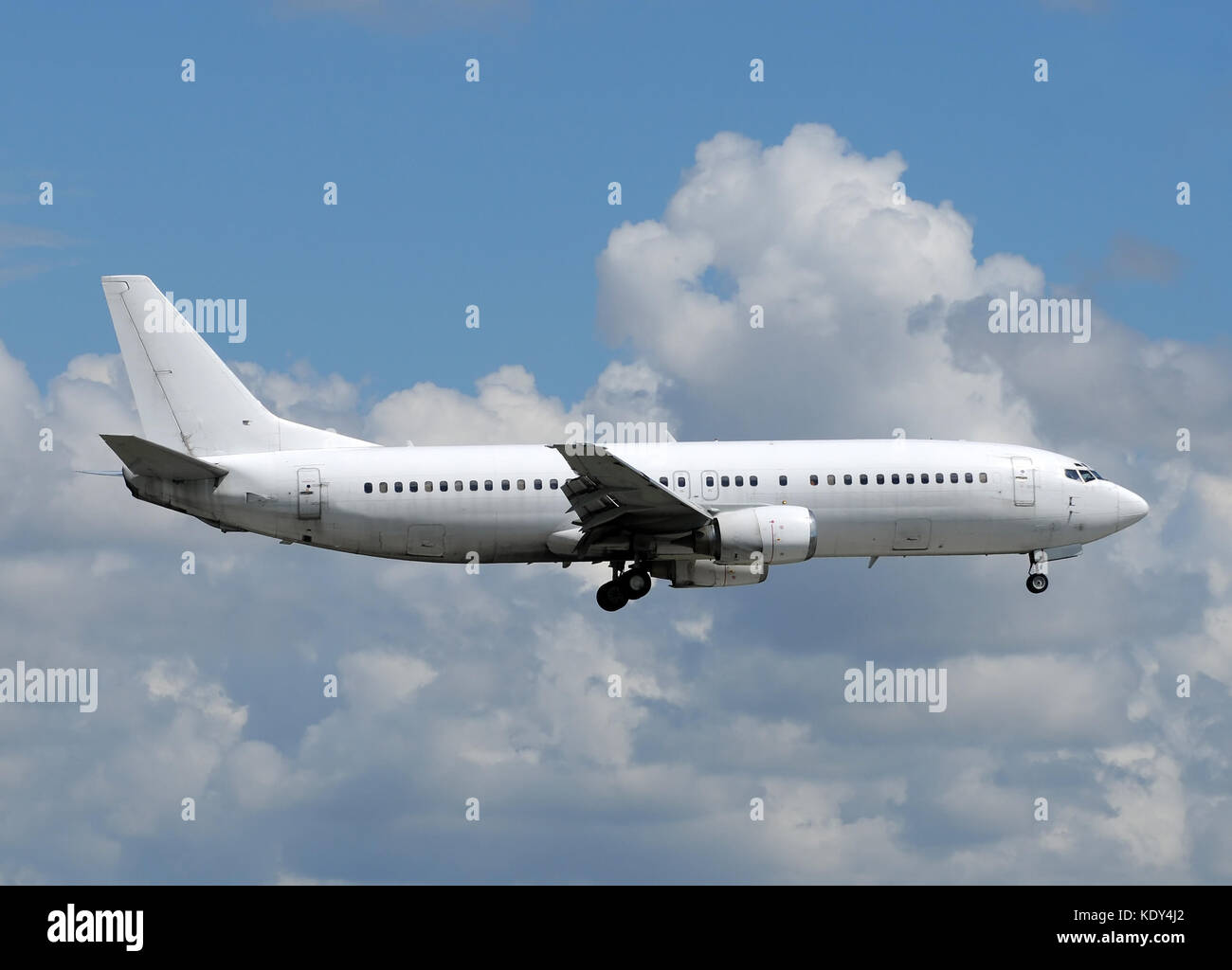 Unmarked white passenger jet airplane side view Stock Photo - Alamy