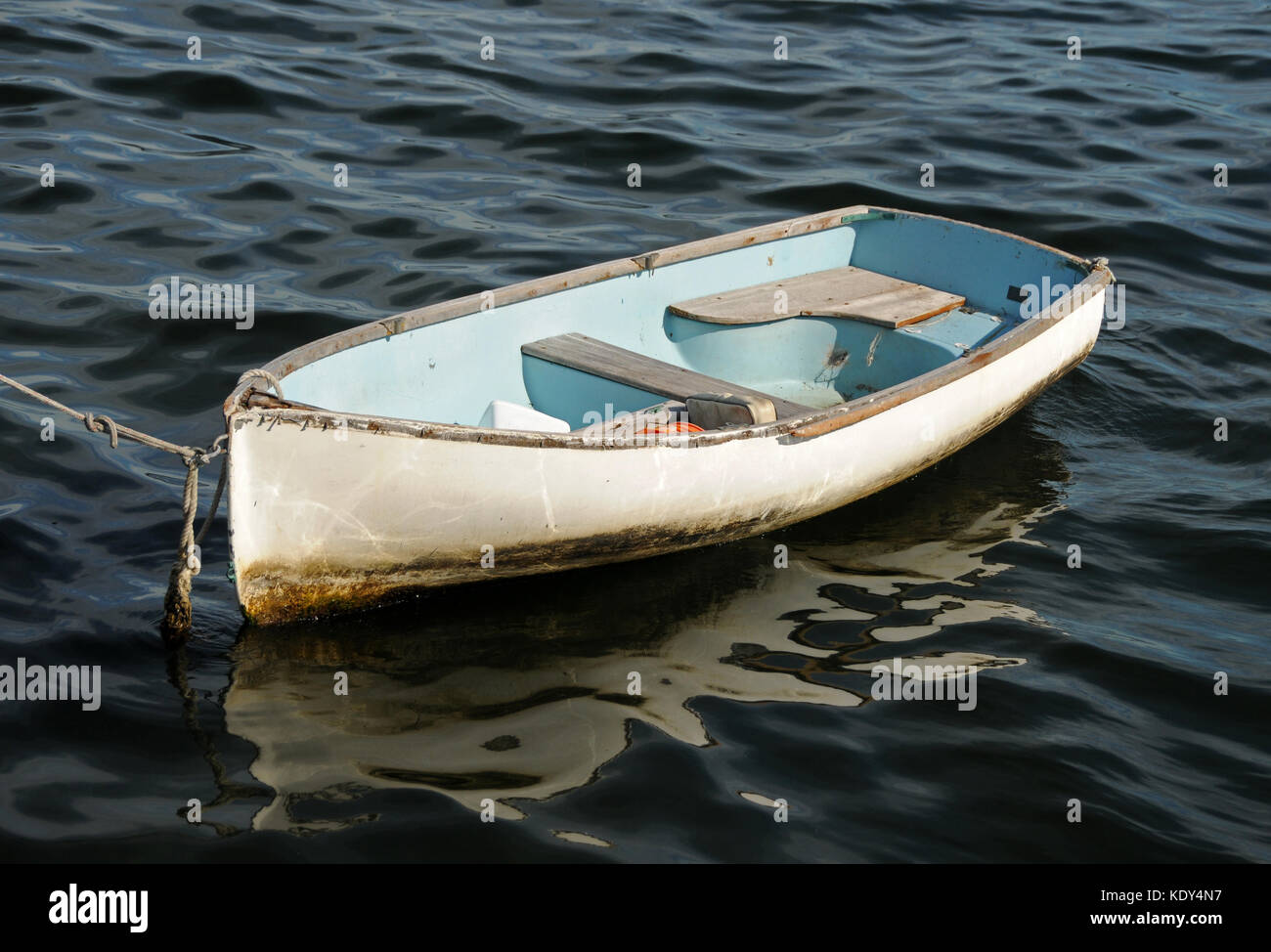 Old wooden boat in calm water Stock Photo - Alamy