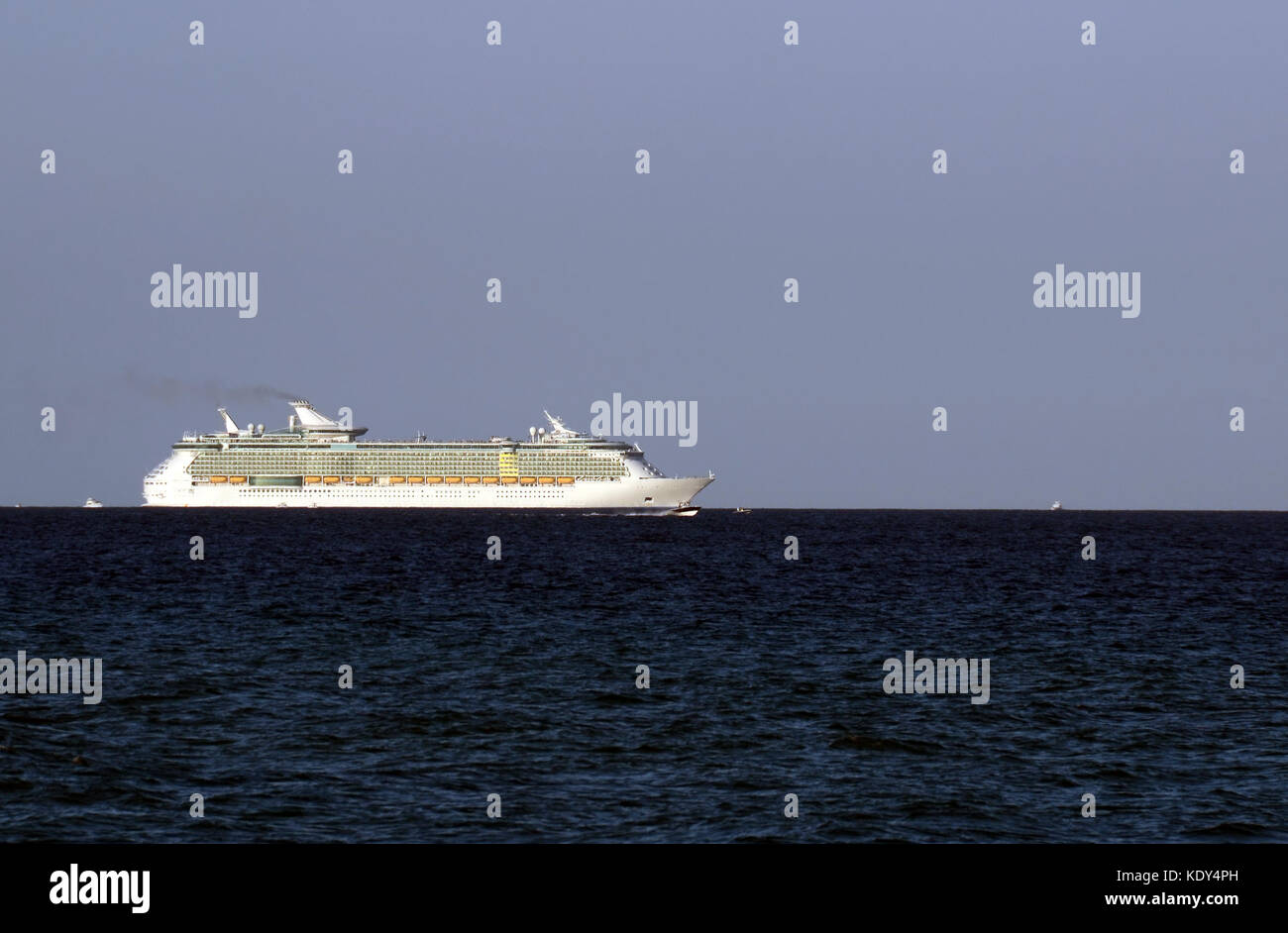 Modern ocean liner on the horizon in open water Stock Photo - Alamy
