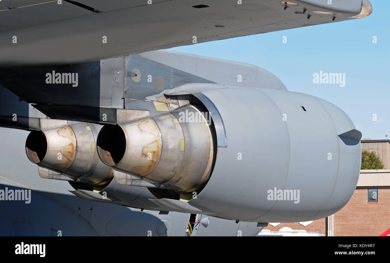Military transport airplane with wing mounted engines Stock Photo - Alamy