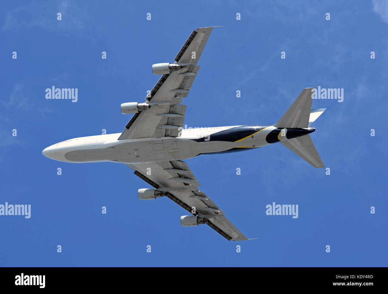 Heavy jumbo jet seen from below Stock Photo - Alamy