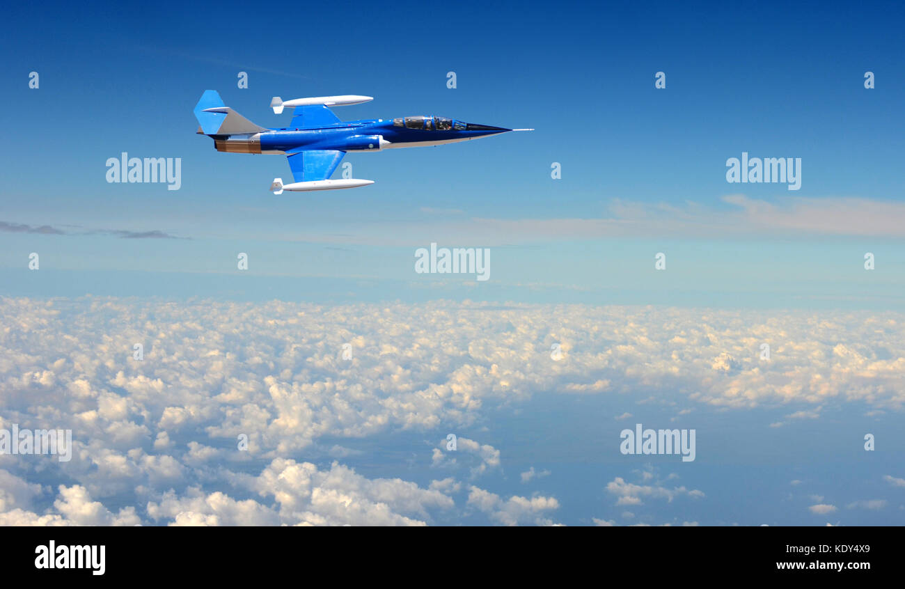 Military jet flying at high altitude Stock Photo - Alamy
