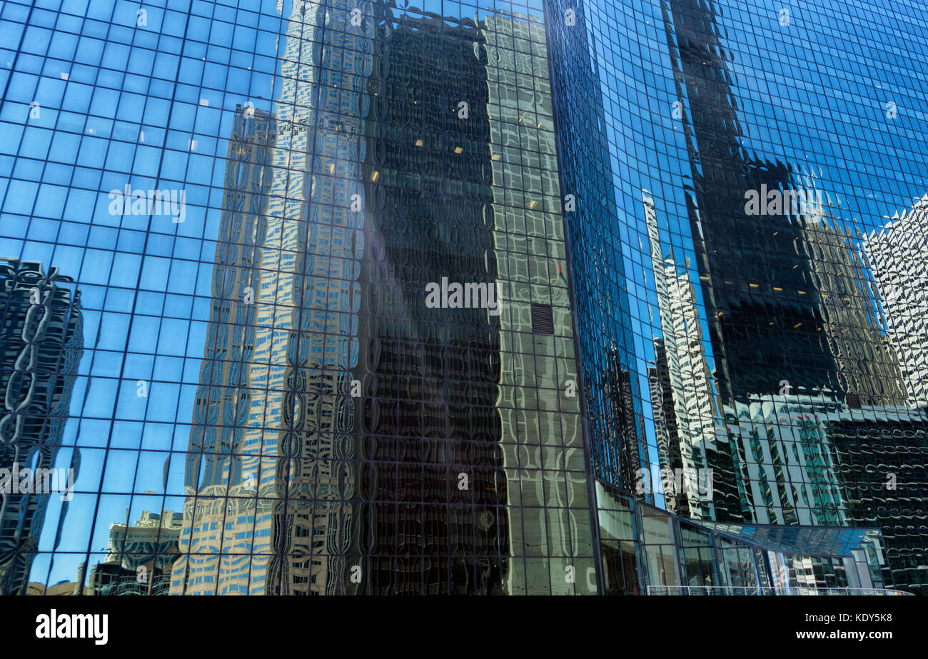 Reflections on the windows of a skyscraper in downtown Chicago Stock ...