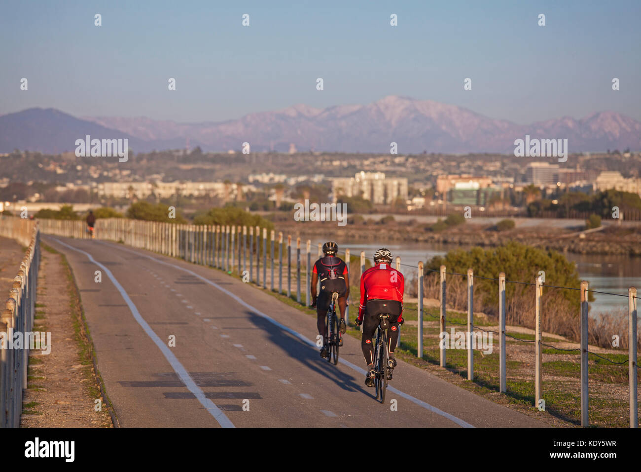 Bicycle path along Ballona Creek with the snow covered San Gabriel ...