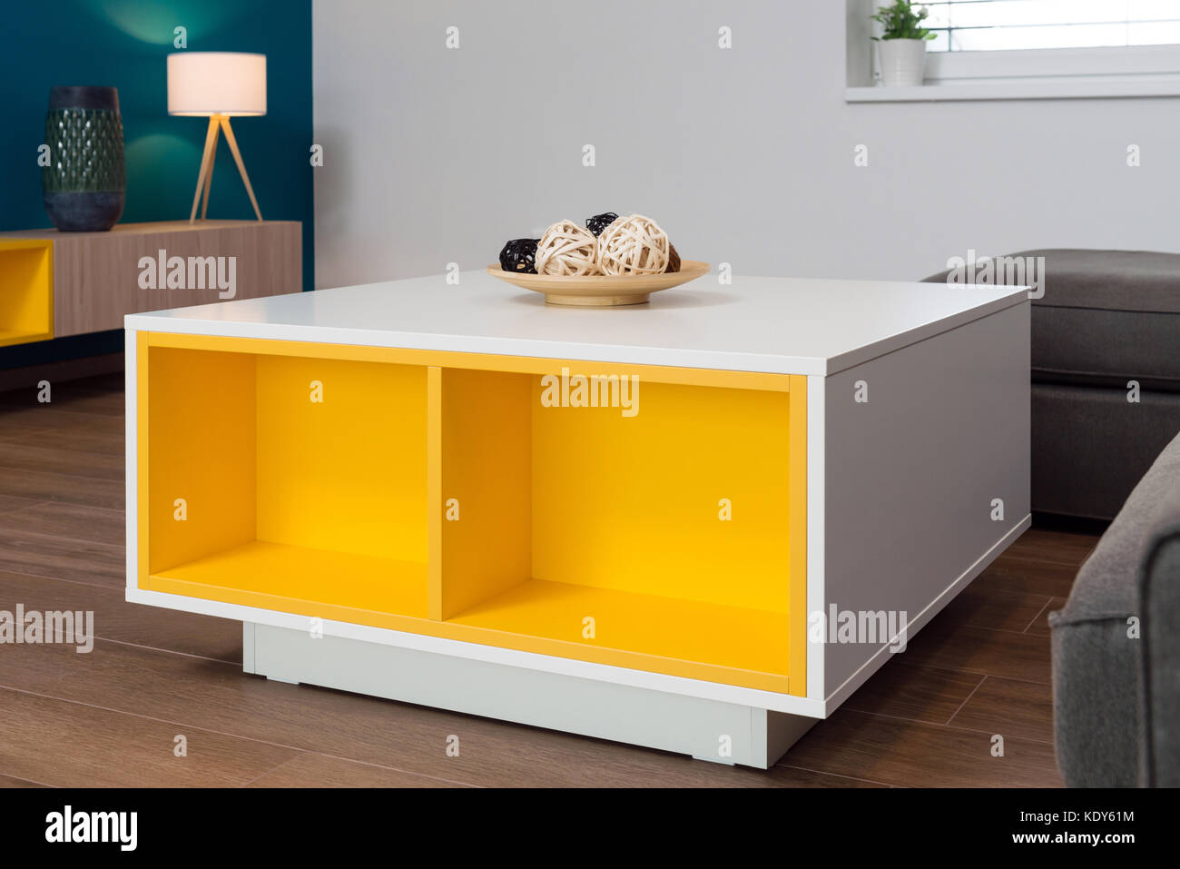 Table in contemporary living room interior Stock Photo - Alamy