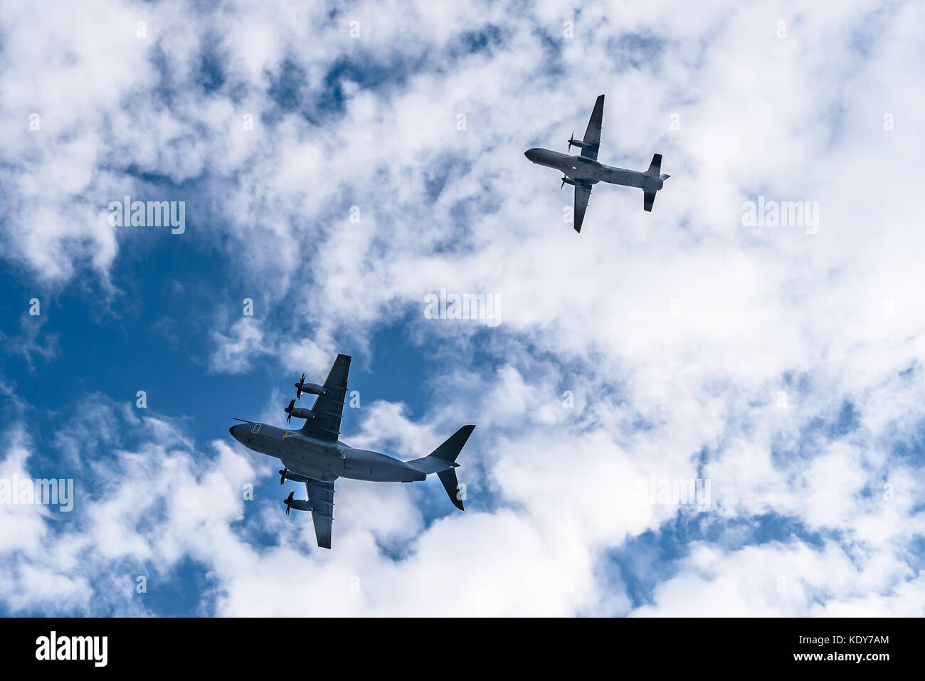 Transport military aircrafts flying in formation Stock Photo - Alamy